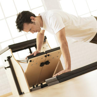 MERRITHEW™ Split-Pedal Stability Chair™ with Handles